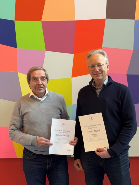 Frieder Mugele and Dirk van den Ende both received an award from the ...